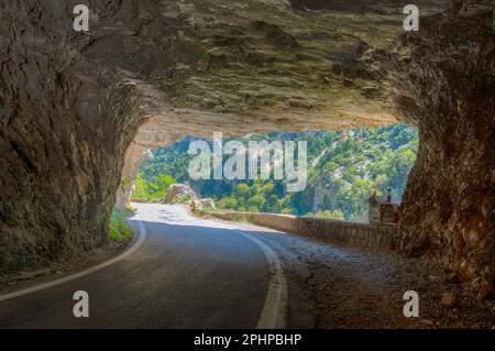 Tunnel at a road passing through Langada pass in Greece Stock Photo - Alamy