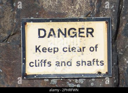 Danger Mine Shaft Sign on Fence Protecting Mineshaft Collapse Minions ...