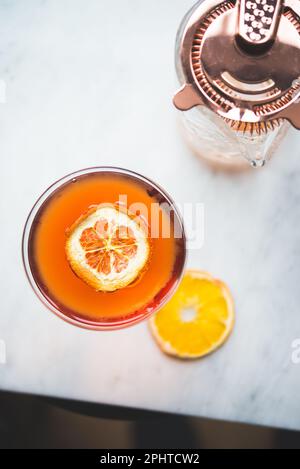 Boulevardier cocktail and orange zest on rusty background Stock Photo ...