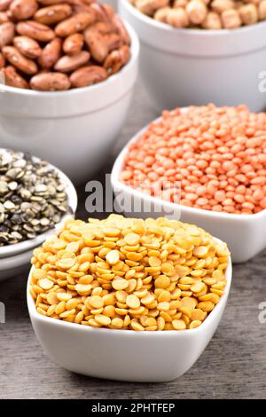 Raw chana dal in bowl at table Stock Photo - Alamy