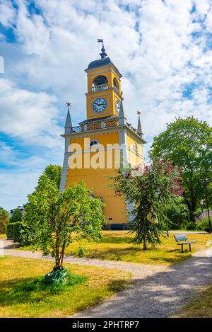 Yellow clock tower in Karlskrona, Sweden Stock Photo - Alamy