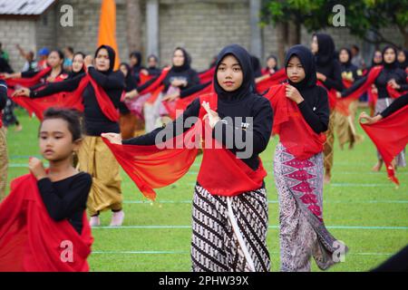 Indonesian performing gambyong dance. This dance comes from central ...