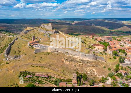 Aerial view of Atienza medieval town and castle in Spain with blue sky ...