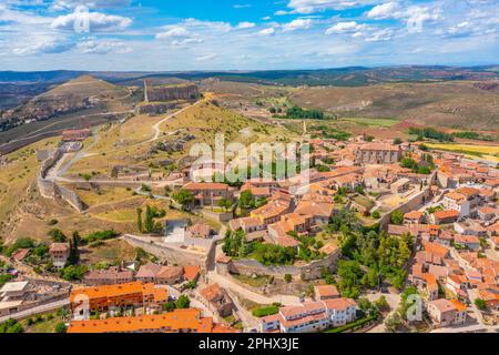 Aerial view of Atienza medieval town and castle in Spain with blue sky ...