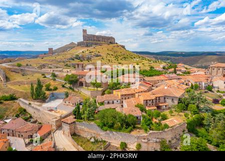 Aerial view of Atienza medieval town and castle in Spain with blue sky ...
