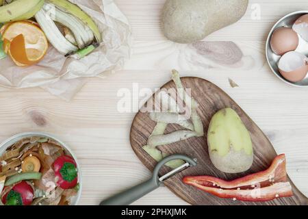 The process of peeling vegetables for cooking and composting the peels ...