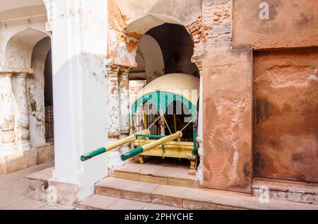 A vintage palanquin in Lalji Temple in the Kalna Rajbari Complex of ...