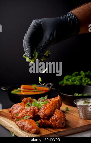 Appetizing overhead shot of juicy grilled beef steak slices served with ...