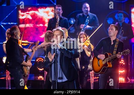 Singer Howard Carpendale with band performing on stage. 50 years of ZDF ...