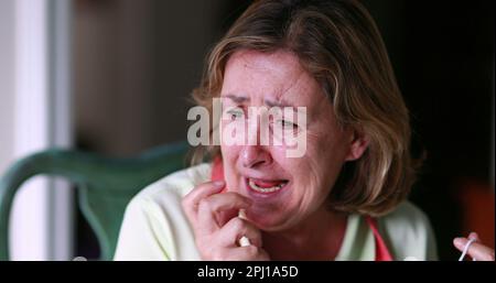 Older woman shock reaction with mood swings. Portrait of senior lady ...