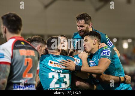 Jake Wardle #4 of Wigan Warriors goes over for a try during the Betfred ...