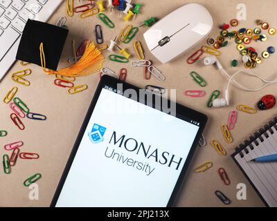 In this photo illustration, a Monash University logo seen displayed on ...