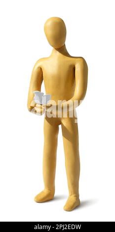 Yellow plasticine human figure with dove and planet isolated on white ...