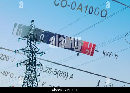 Double exposure of electricity meter and high voltage tower with ...