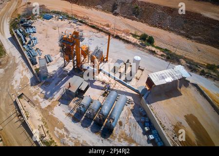Structures of cement producing plant. Aerial view of huge industrial ...