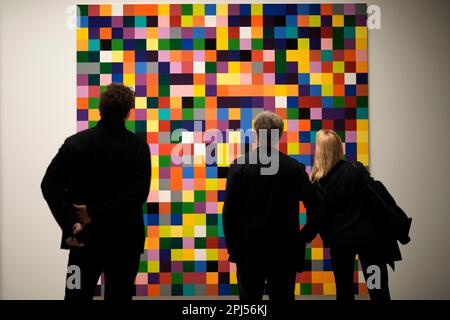People looks at painting '4900 Colours (excerpt)' in a new exhibition ...