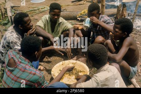 Africa Liberia Kpelle tribe village scene traditional cylindrical ...