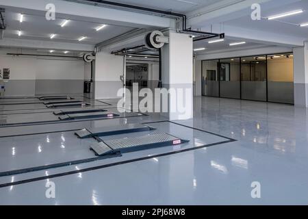 New car repair center. Empty car repair center. Interior of empty car ...