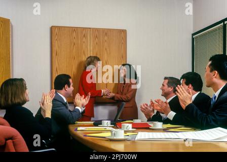1996 HISTORICAL HANDSHAKE OFFICE WORKERS MEETING AROUND TABLE Stock ...