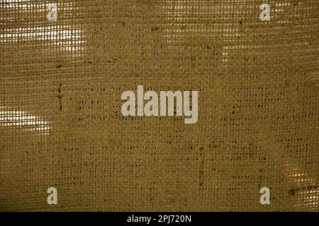 light beige burlap background in daylight close up Stock Photo - Alamy