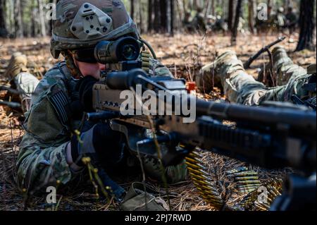 M249 machine gun on position isolated on white Stock Photo - Alamy