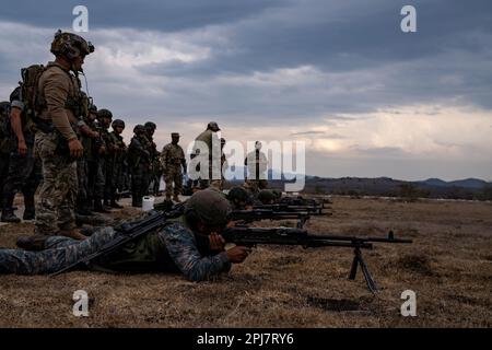 7th Special Forces Group (Airborne) jumpmasters issue commands inside a ...