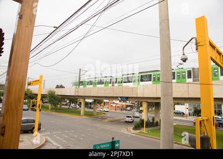 Electrical train going trough Lima Peru Stock Photo - Alamy
