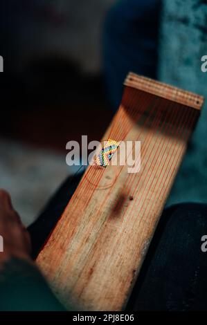 Embera Community of Medellin making Jewelry in Colombia Stock Photo - Alamy