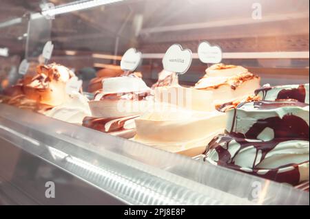 Showcase with different kinds of ice cream, closeup view Stock Photo ...