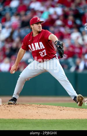 March 31, 2023: Alabama pitcher Kade Woods #8 looks on from the dugout ...