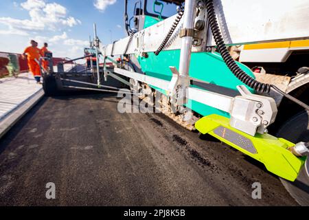 Road laying construction machine with ultrasonic grade, slope, non ...