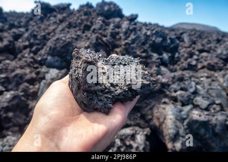 Variety of forms of basalt solidified lava (clinker): hawaiian is main ...