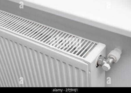 Closeup view of modern radiator. Central heating system Stock Photo - Alamy