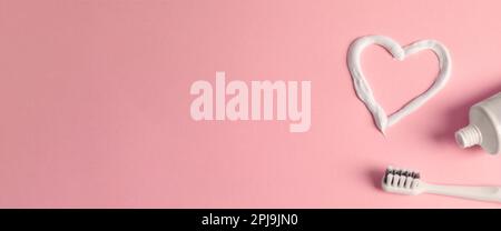 Heart shape of toothpaste with toothbrush, top view. Oral care and ...