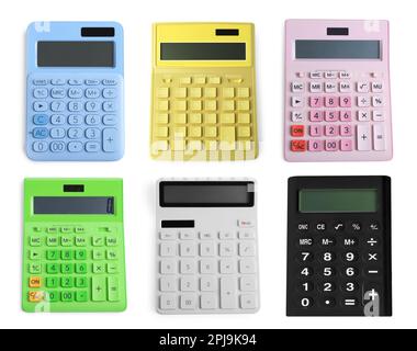 Set of different calculators on white background Stock Photo - Alamy