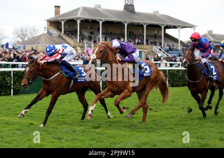 Doddie's Impact (left) ridden by jockey Billy Loughnane on their way to ...