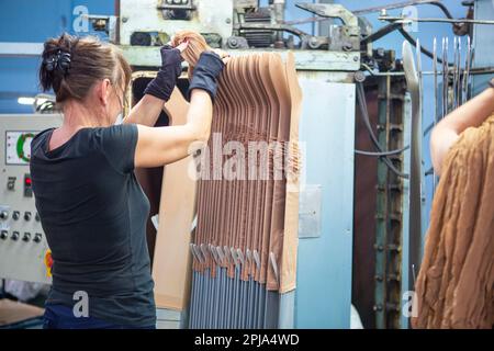production of capron tights. Textile factory with machines and ...