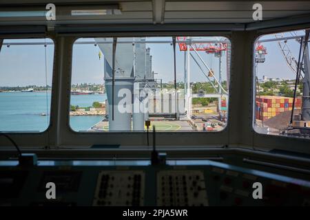 View from bulk carrier's captain's bridge to bulk cargo berth. View of ...