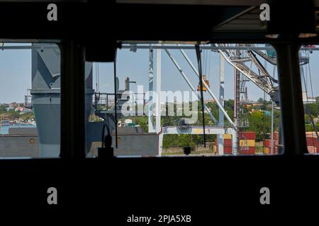 View from bulk carrier's captain's bridge to bulk cargo berth. View of ...