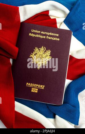 France passport with European Union flag in background , French ...