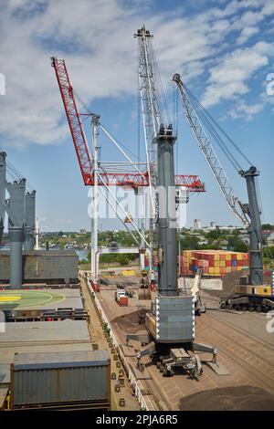 Operations with coal in seaport. Loading coal on bulk carrier. Coal ...