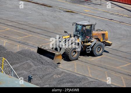 Operations with coal in seaport. Loading coal on bulk carrier. Coal ...