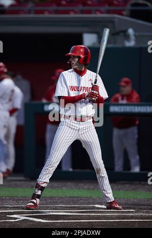 Eli Serrano III (16) of the North Carolina State Wolfpack at bat ...