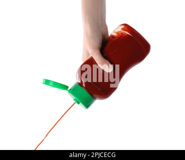 Woman holding a bottle of tomato ketchup Stock Photo - Alamy