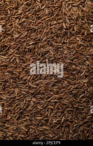 Top view of cumin seeds pattern for food background Stock Photo - Alamy