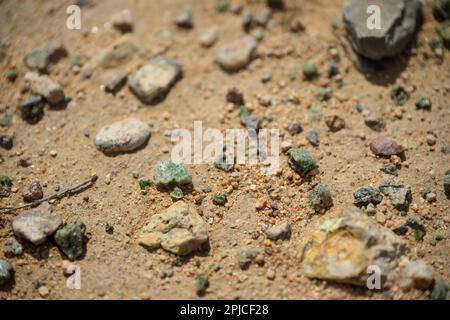 Pieces of Trinitite, a green glass-like substance that was created from ...