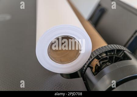Roll of White printing paper to be loaded on printer Stock Photo - Alamy