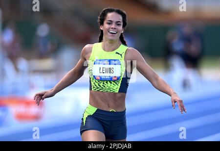 Torrie Lewis icelebrates winning the women’s 200 metres during the 2023 ...