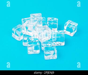 top view of ice cubes of different sizes on blue background Stock Photo ...