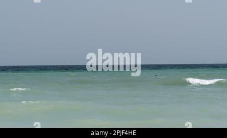 Gentle surf on a late afternoon Stock Photo - Alamy